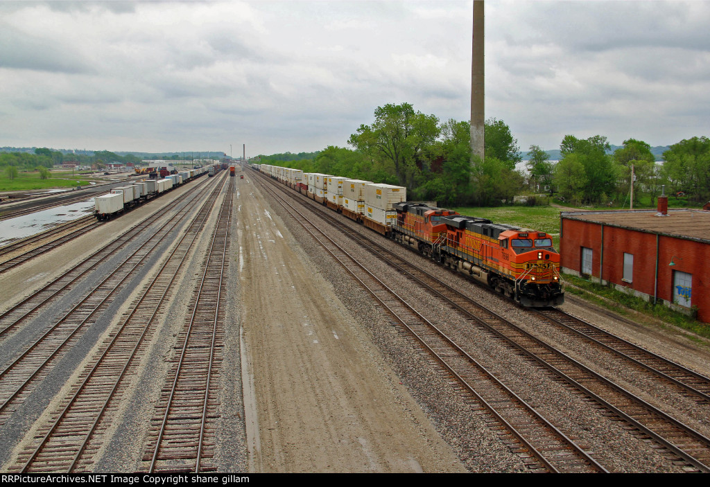 BNSF 7698 Leads a Short z train Wb.